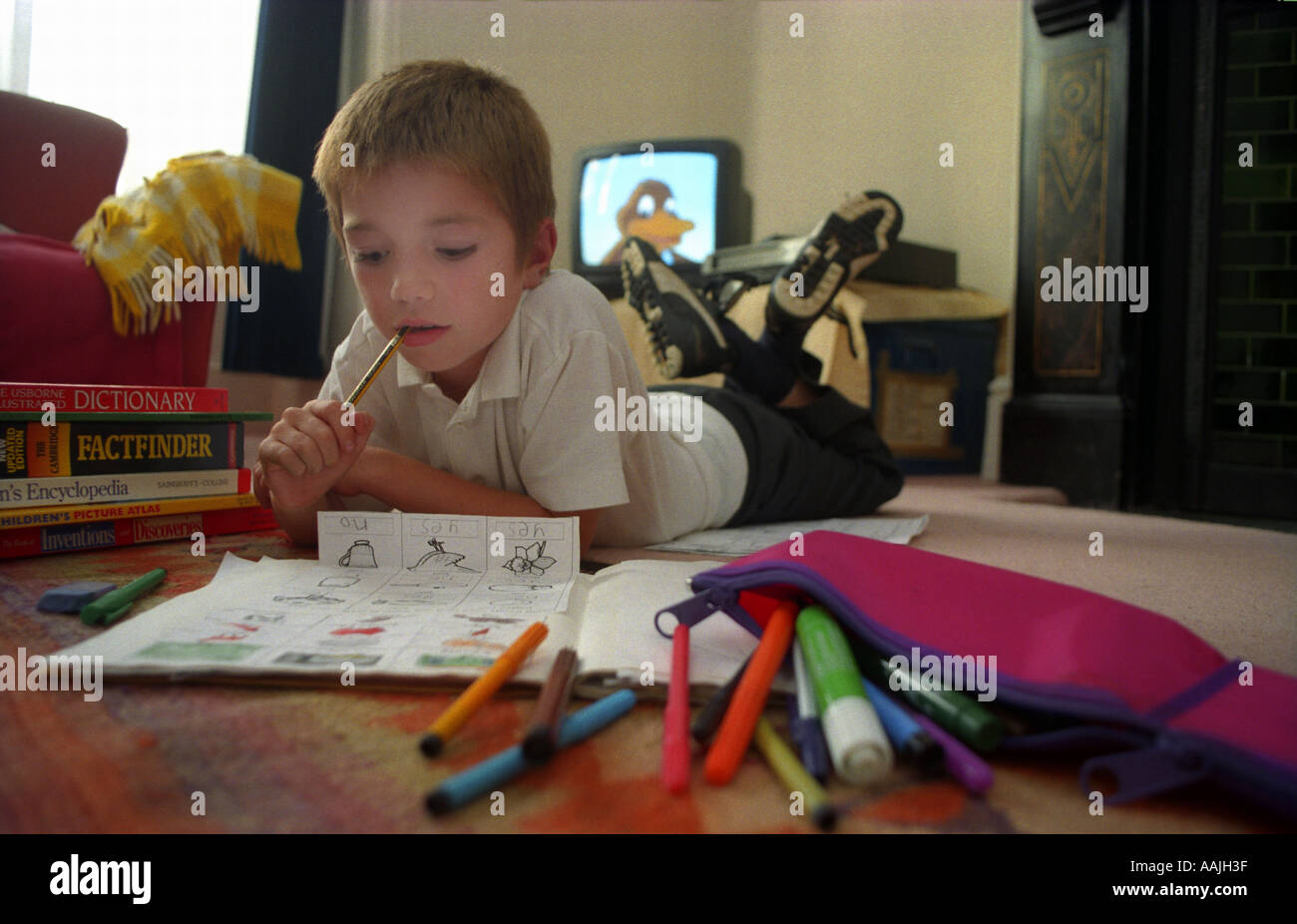 Homework posed by model Picture by Andrew Hasson 1998 Stock Photo - Alamy