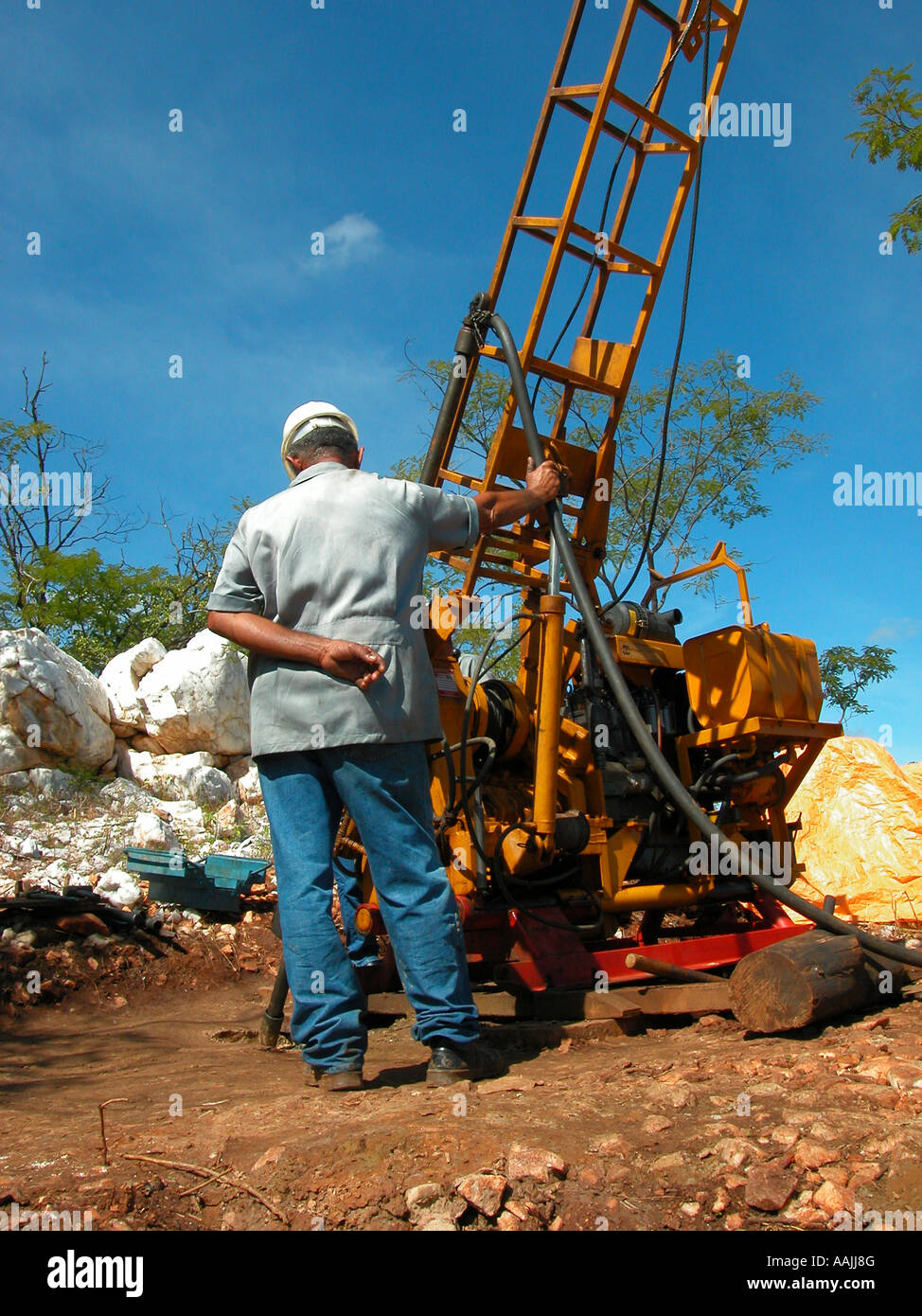 Mining worker working in feldspar quarry Stock Photo - Alamy