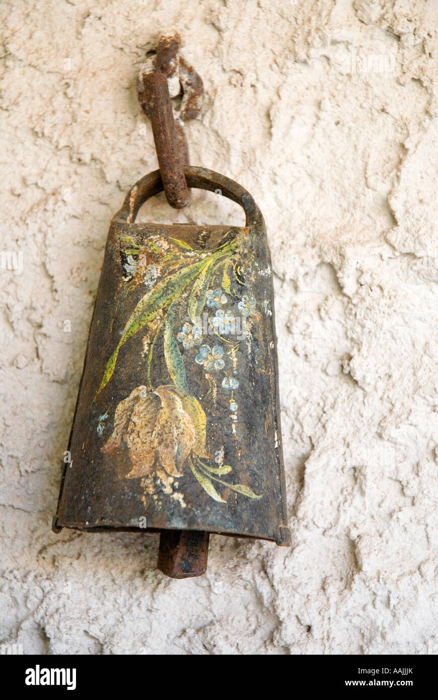 decorated cow bell in a wall Stock Photo - Alamy