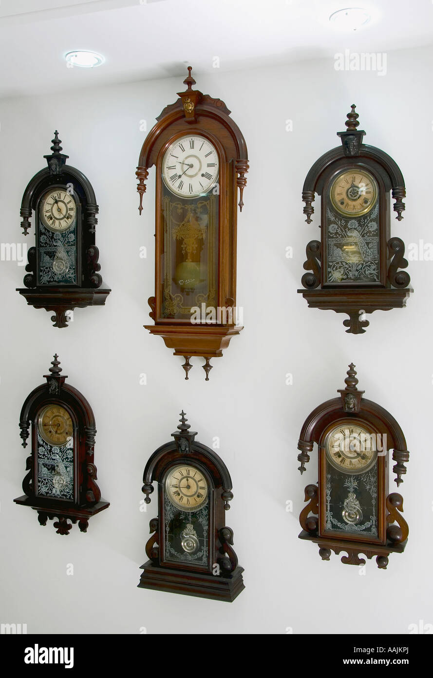 collection of 6 antique clocks, many clocks in a wall Stock Photo - Alamy