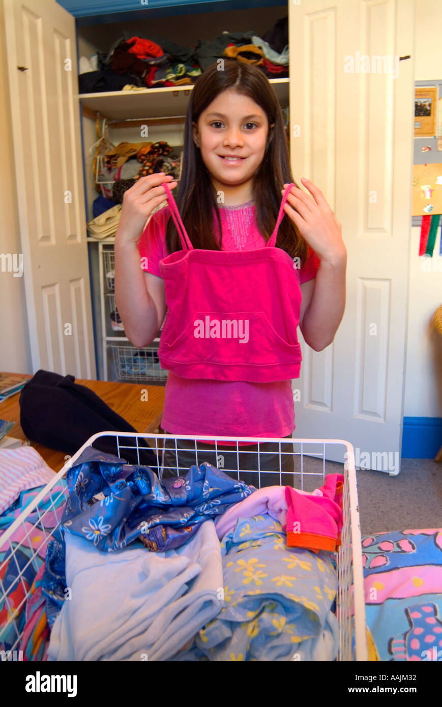 Child tidies bedroom hi-res stock photography and images - Alamy