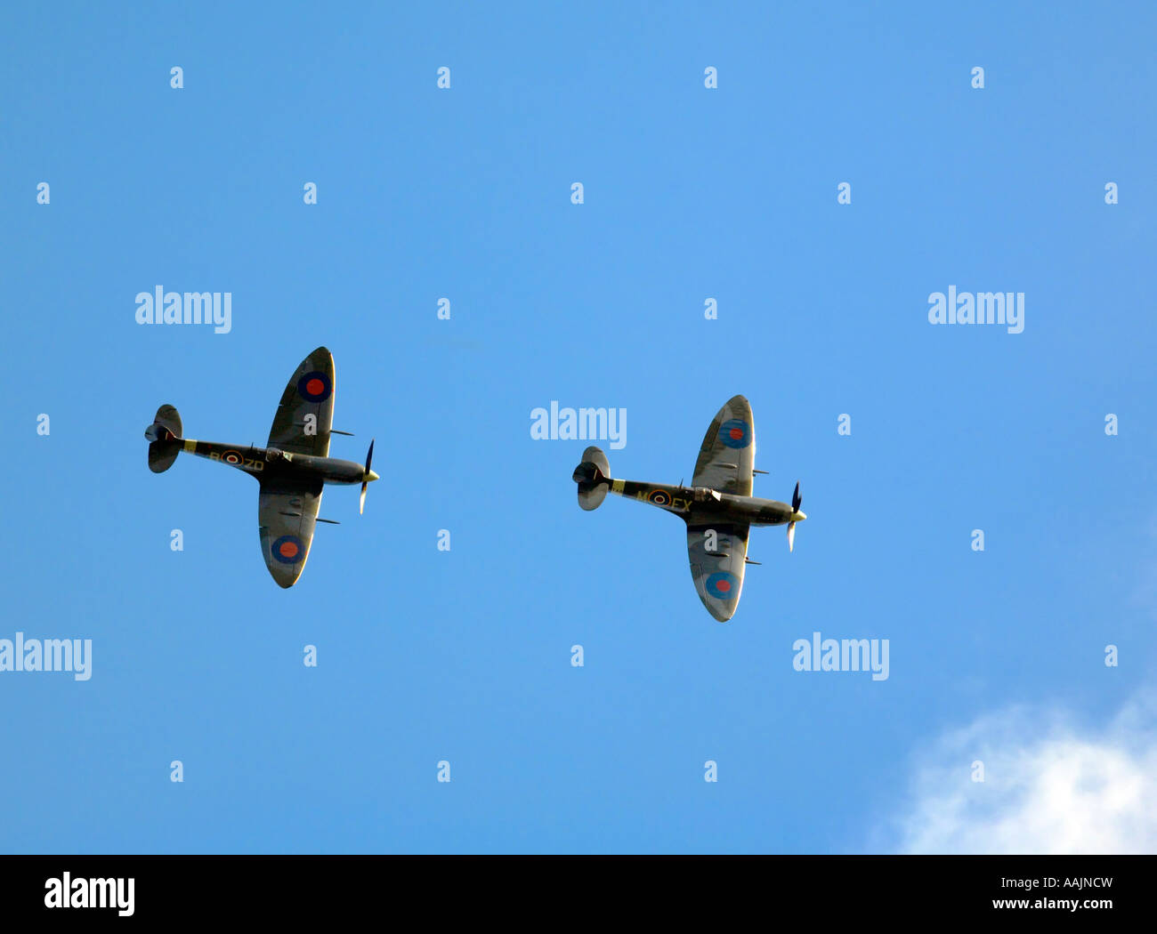 Two Spitfires in flight Stock Photo - Alamy