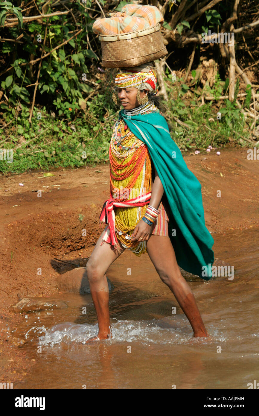 Bonda woman crossing a stream in Machkund, Orissa, India Stock Photo ...