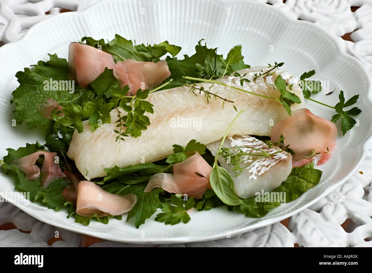 plate of raw cod fish Stock Photo - Alamy