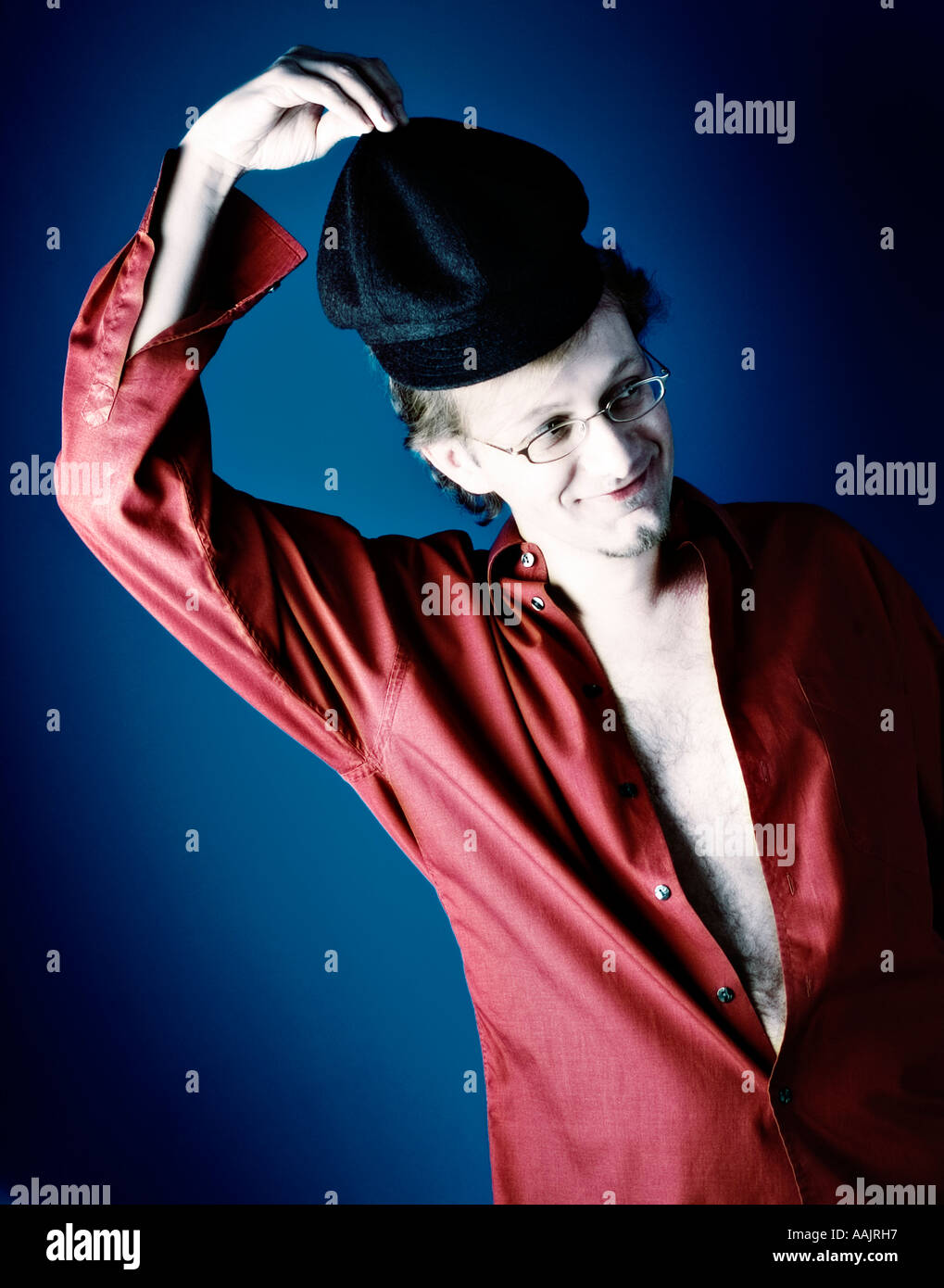 man pulling his hat Stock Photo - Alamy