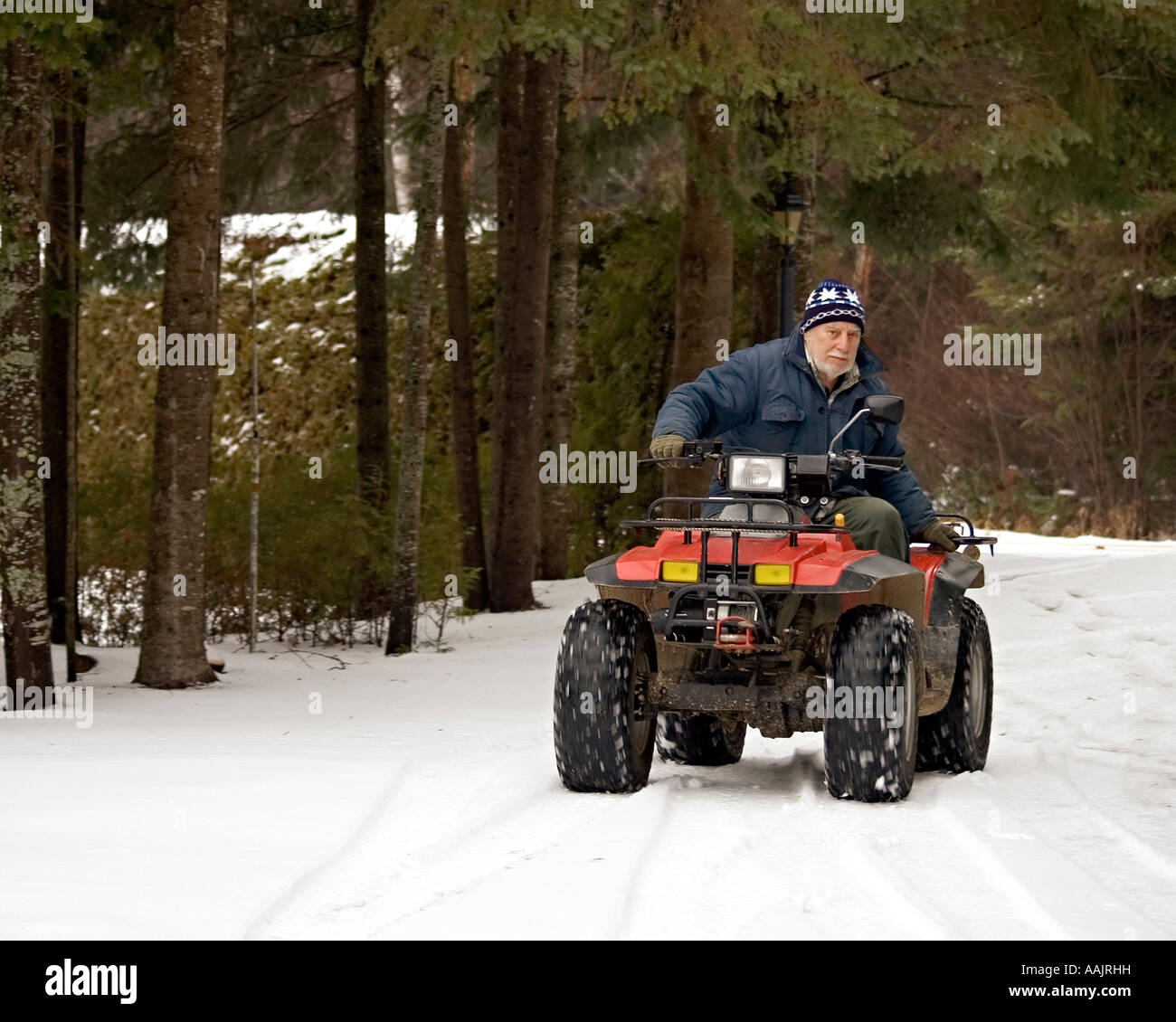 Senior man on ATV, four wheel vehicle Stock Photo - Alamy