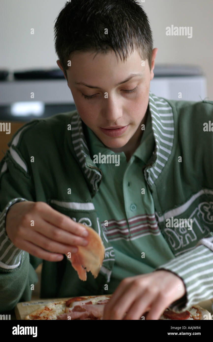 Barry John 15 and severely autistic making a pizza Stock Photo - Alamy