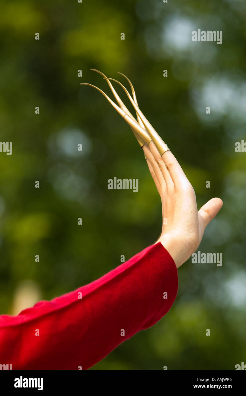 A dancer performs the Fawn Thai dance in Chiang Mai as part of the Miss ...