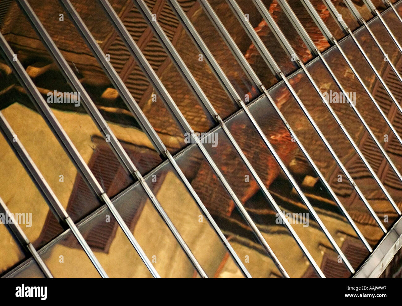 detail of orange reflection on glass ceiling Stock Photo - Alamy