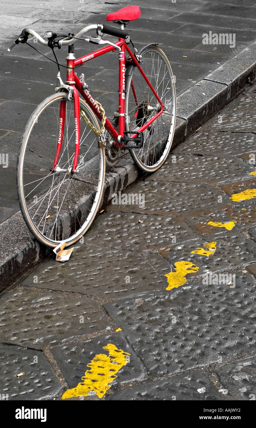 red bycycle and yellow line Stock Photo - Alamy