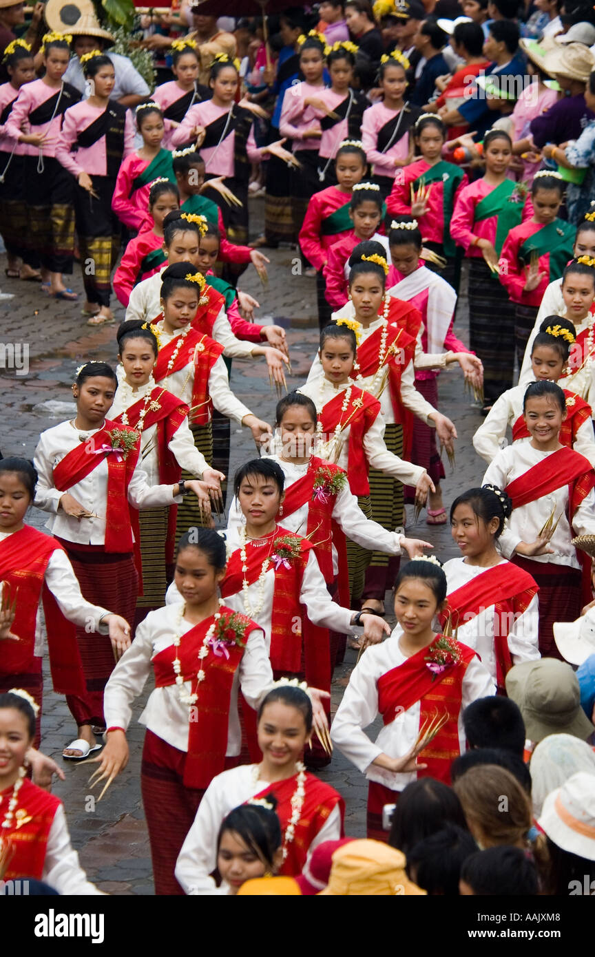 Woman perform a fawn dance in a procession during the Songkran New Year ...