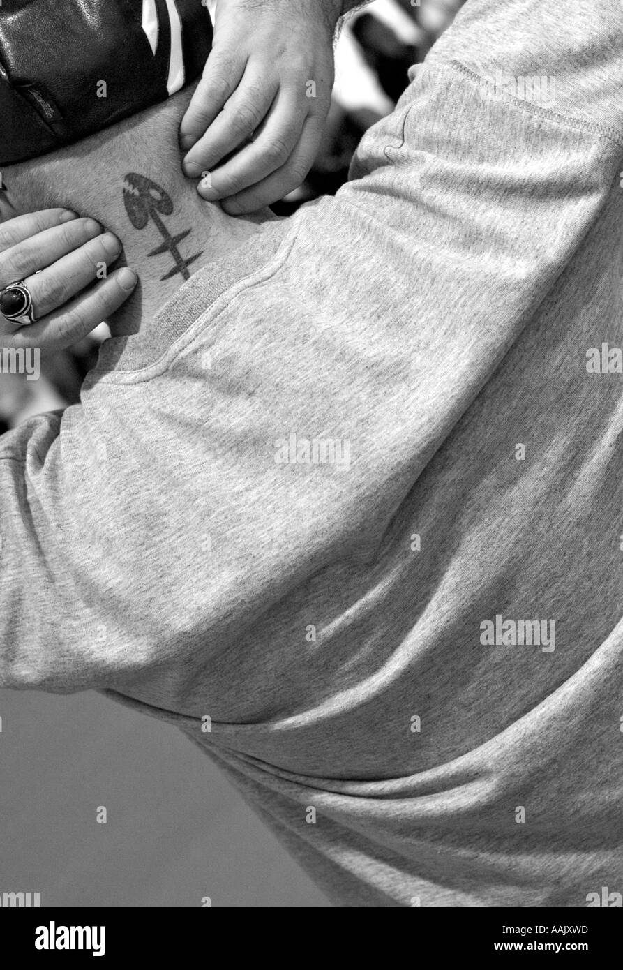 fish tattoo on neck Stock Photo - Alamy