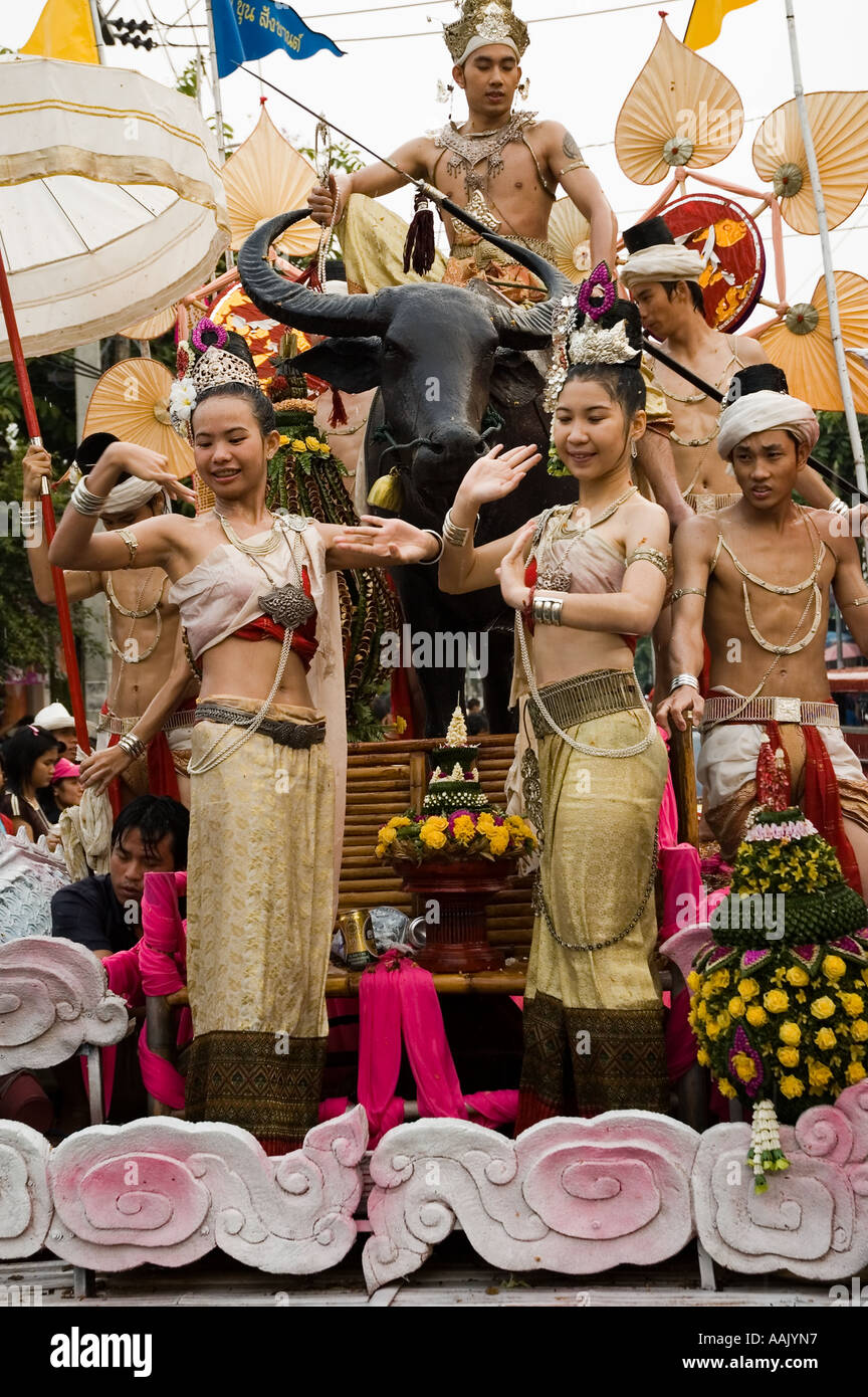 A parade float carries dancers in a procession during the Songkran New ...