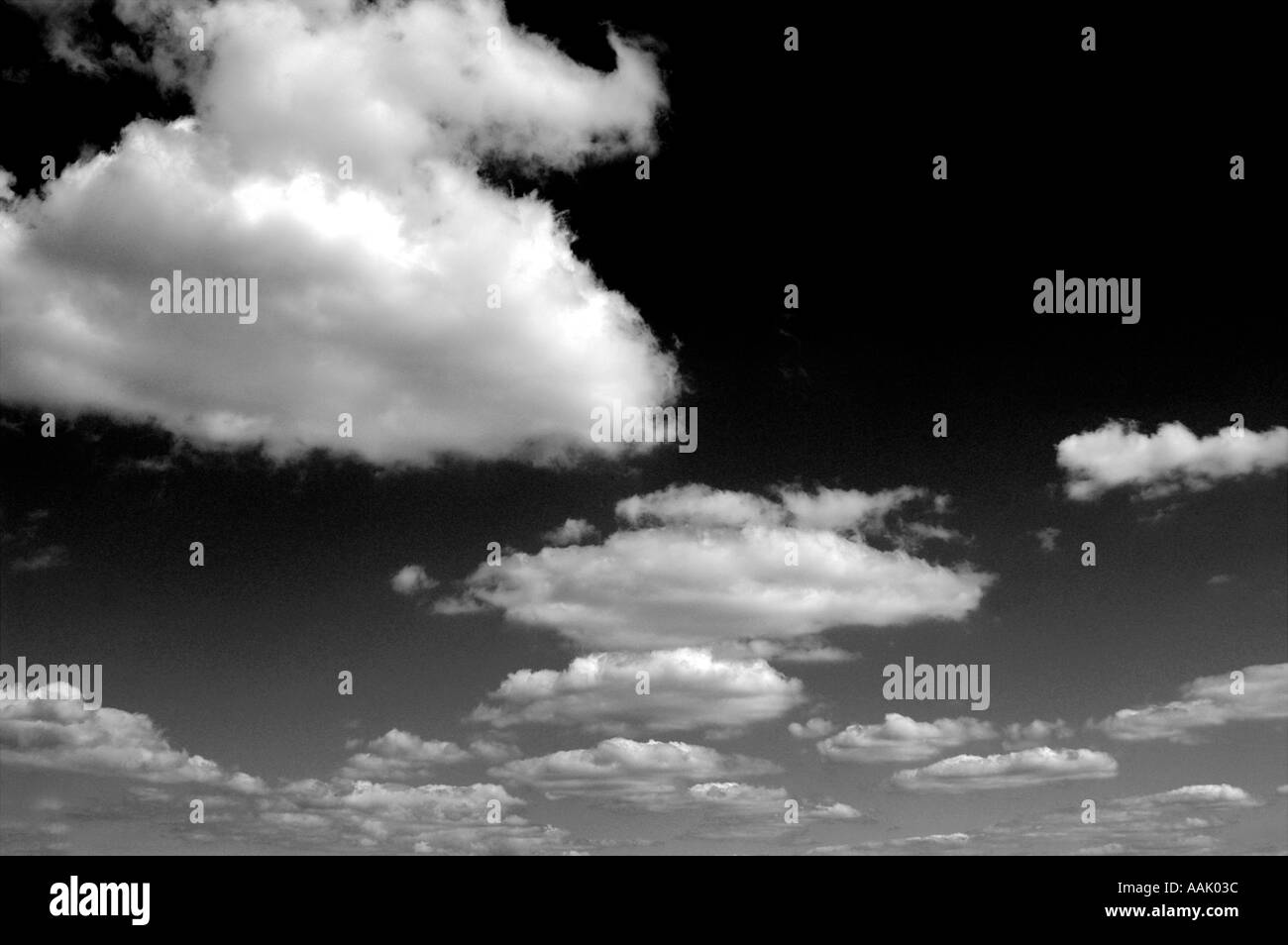 Blue sky puffy cumulus Black and White Stock Photos & Images - Alamy