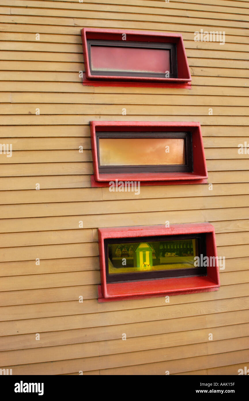 three red frame windows in wooden wall Stock Photo - Alamy