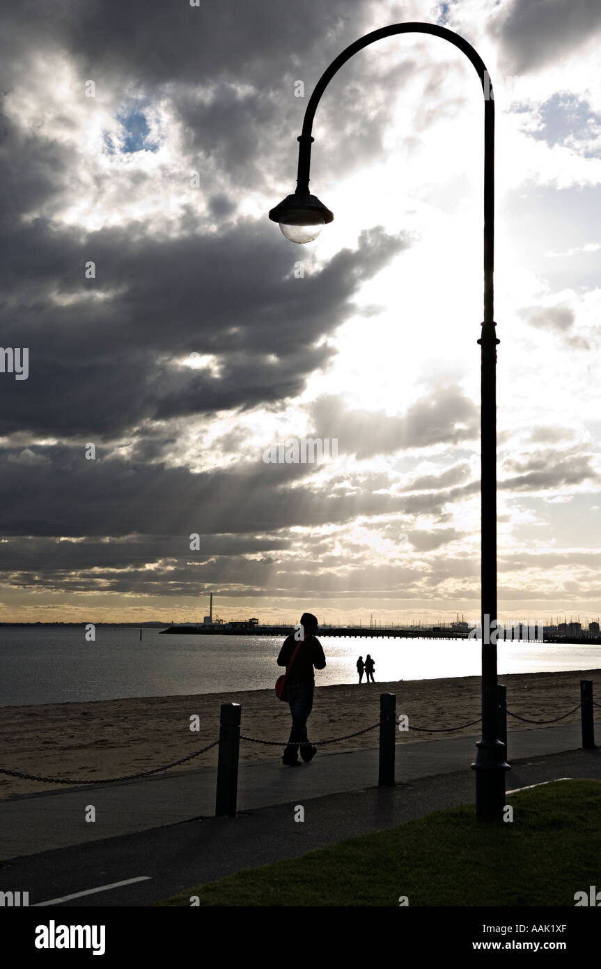melbourne seafront with man running Stock Photo - Alamy