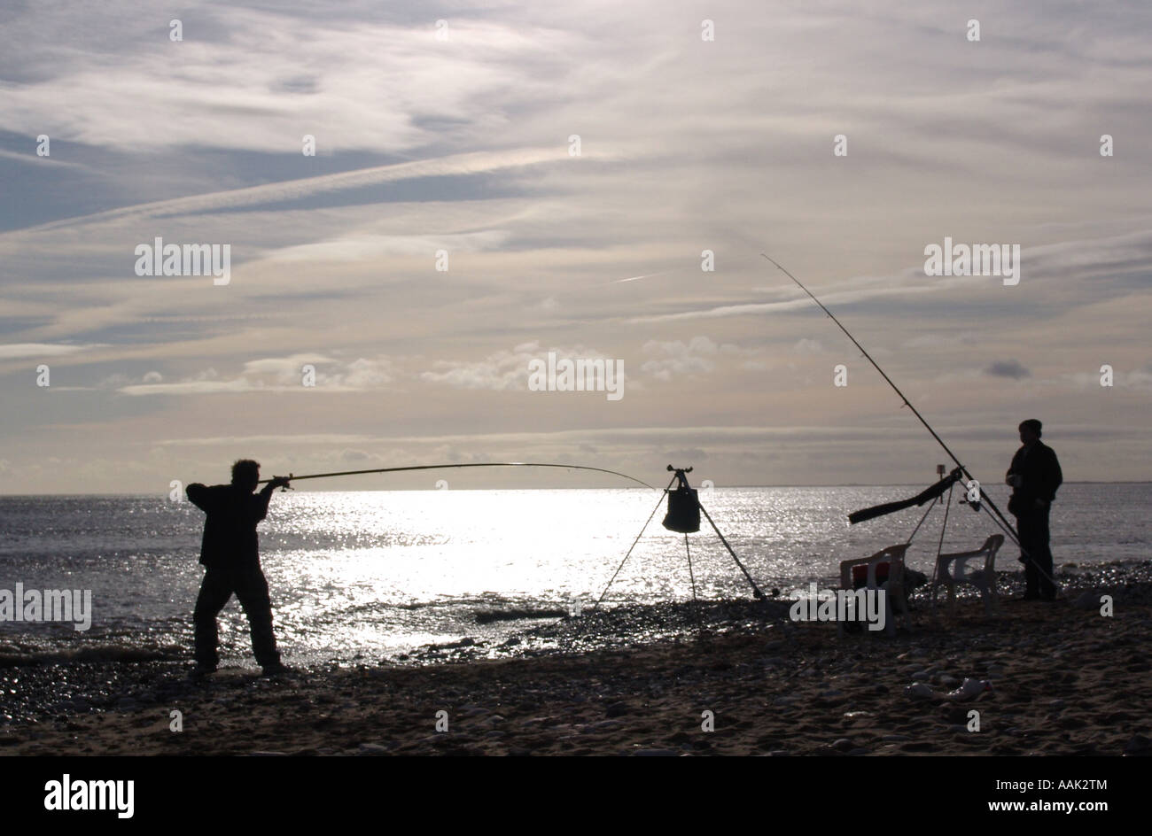 Two men fishing in Bridlington Stock Photo - Alamy