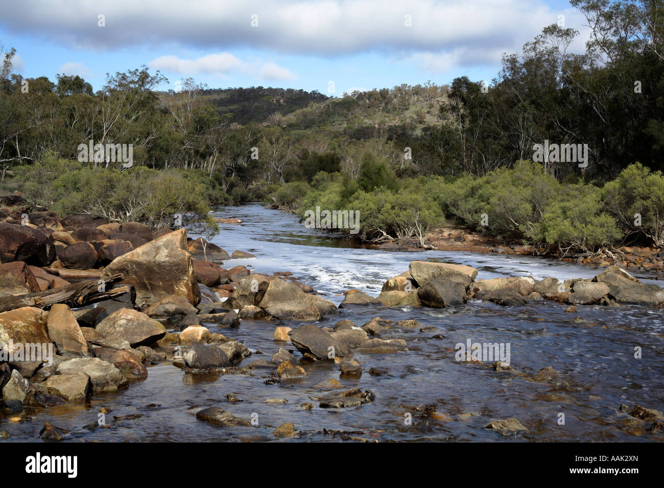 boulders and rocks litter the Avon River landscape at Emu Falls near ...