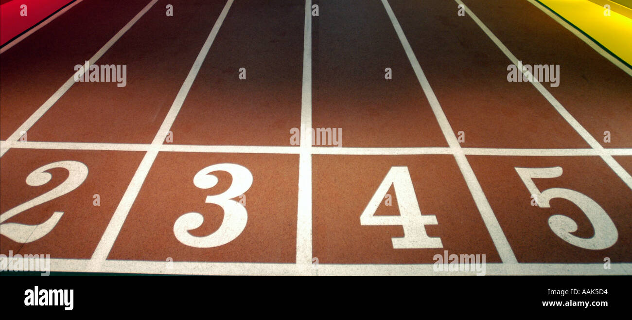 Painted white lines and lane numbers on a running track Stock Photo - Alamy