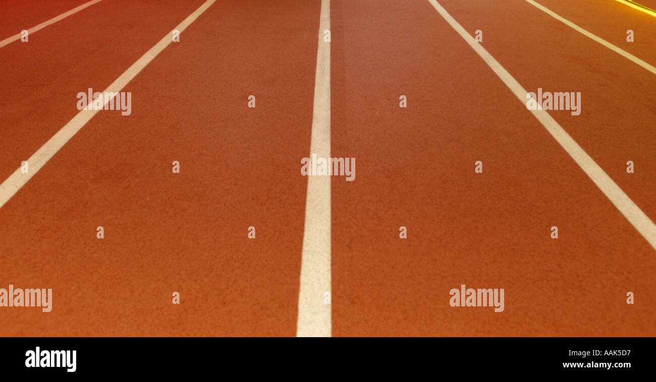 Painted white lines on a running track Stock Photo - Alamy
