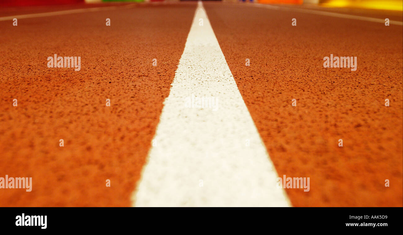 Painted white lines on a running track Stock Photo - Alamy