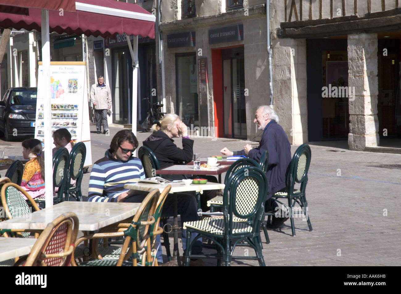 People sitting outside a cafe in Poitiers, France Stock Photo - Alamy
