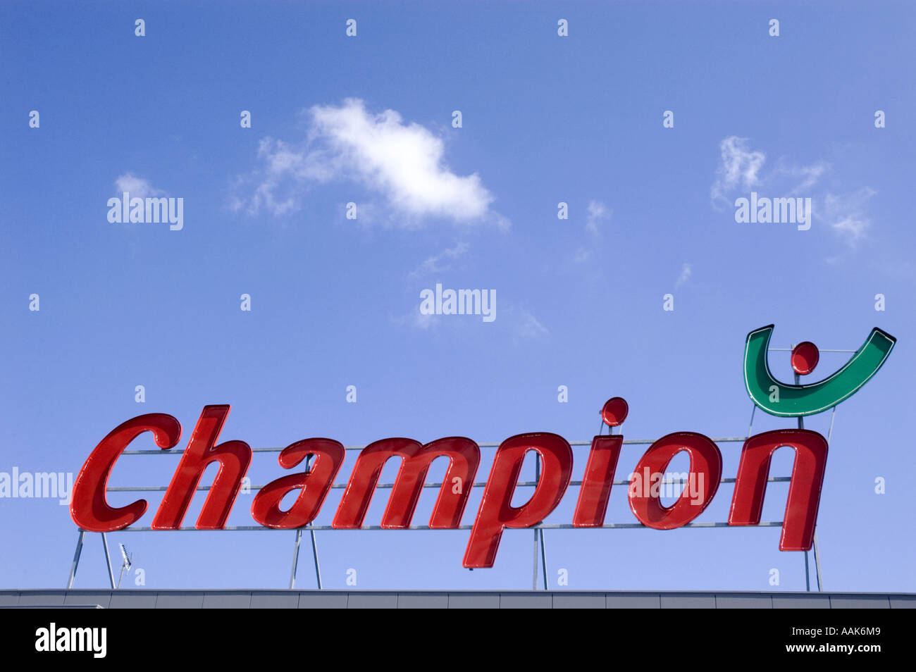 The Champion supermarket sign set against a bright blue spring sky in ...