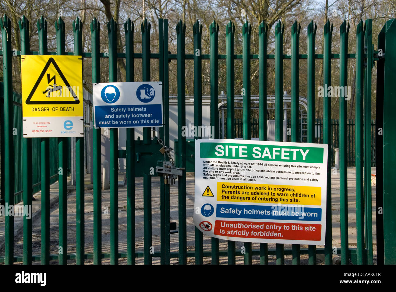 Safety notices at entrance to electricity substation and mobile phone ...