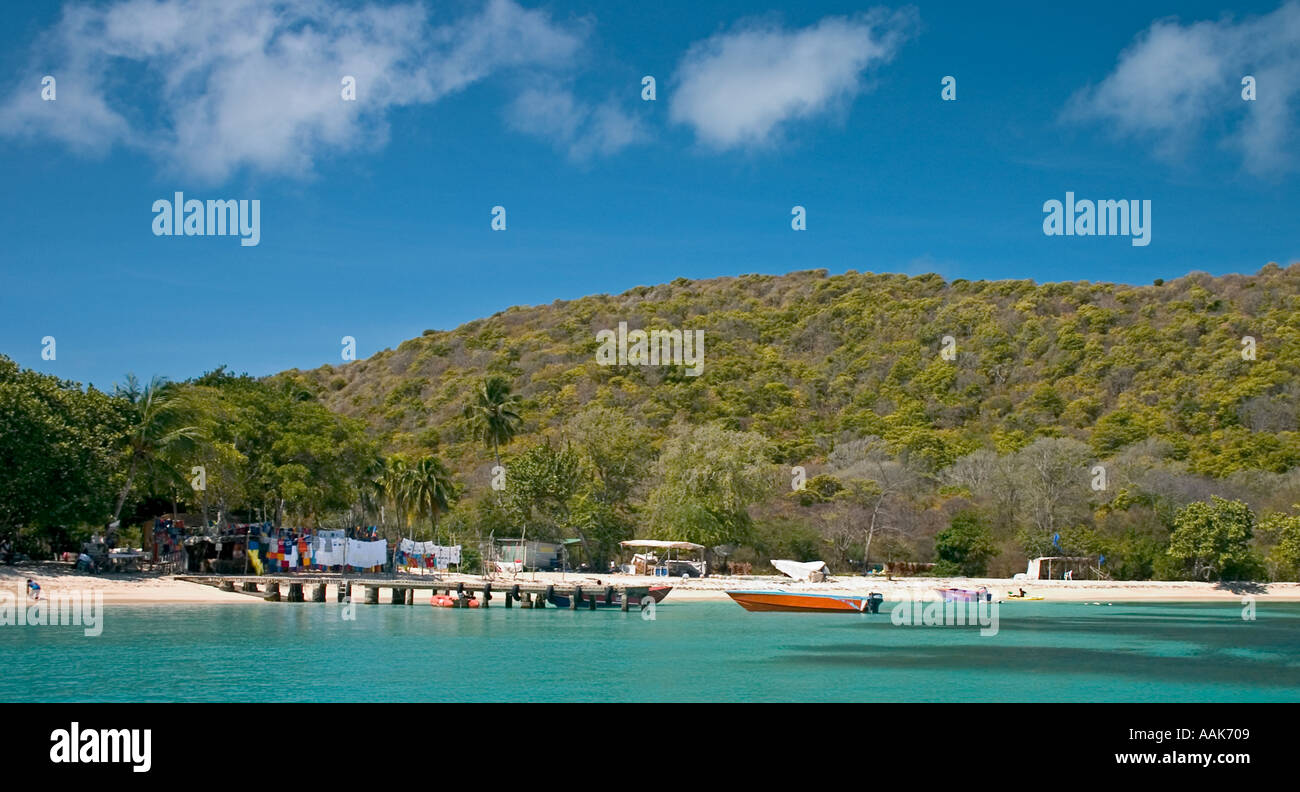 Beach people boats ocean peaceful restful hi-res stock photography and ...