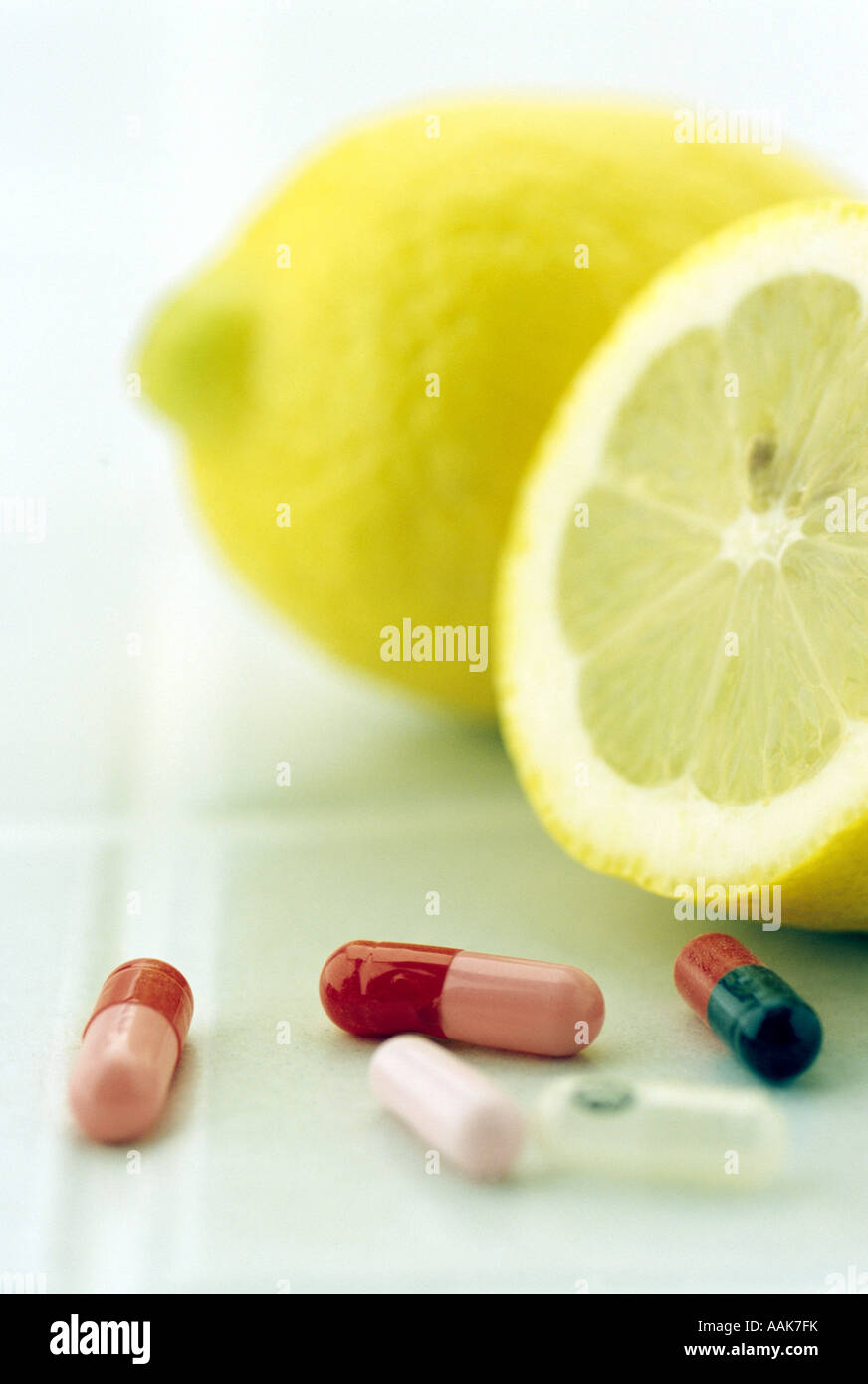 lemon with the tablet Stock Photo - Alamy