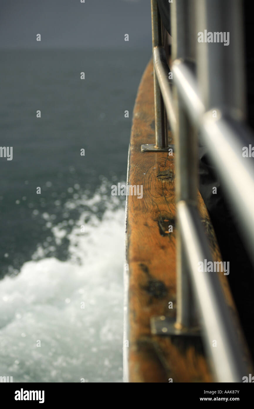 Boat cutting through the sea Iceland Stock Photo - Alamy