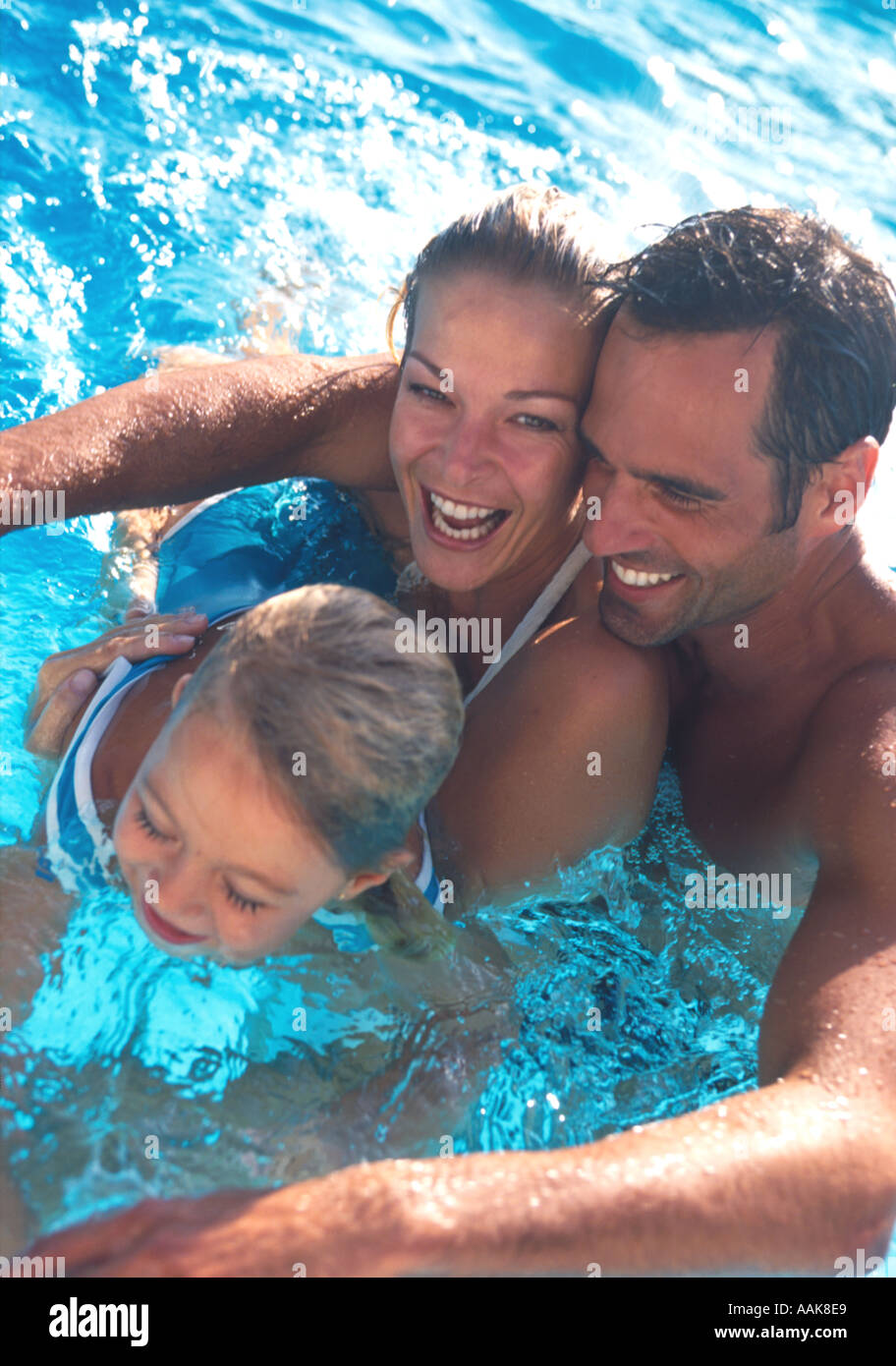 Man woman swimming pool facing camera hi-res stock photography and ...