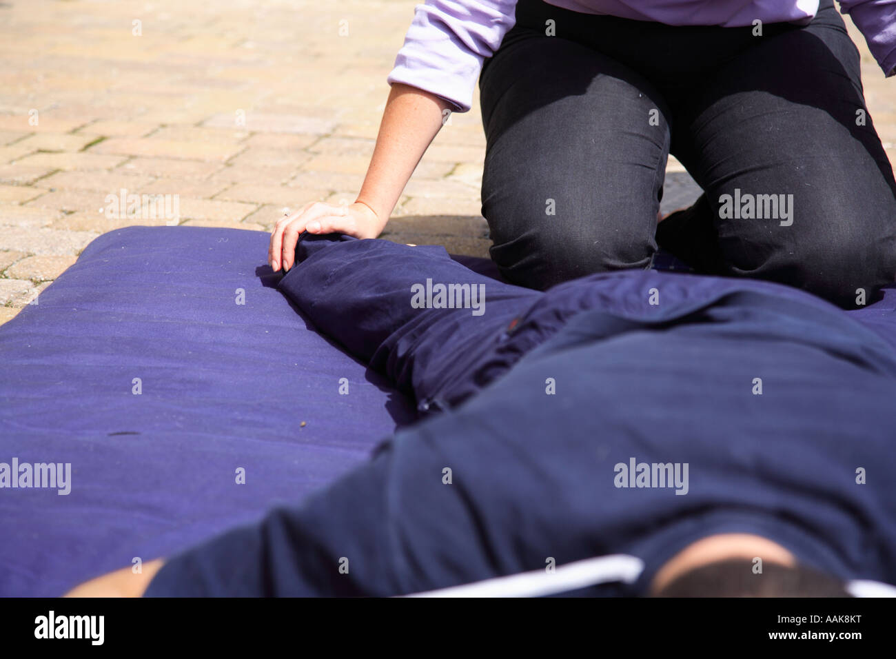 Foot and leg stretch as part of a Thai body massage Stock Photo - Alamy
