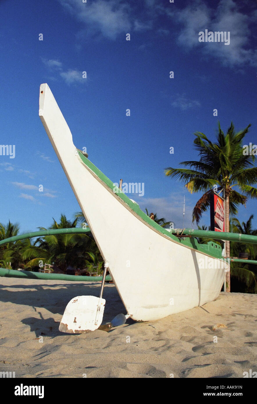 Outrigger Boat On White Beach Stock Photo - Alamy