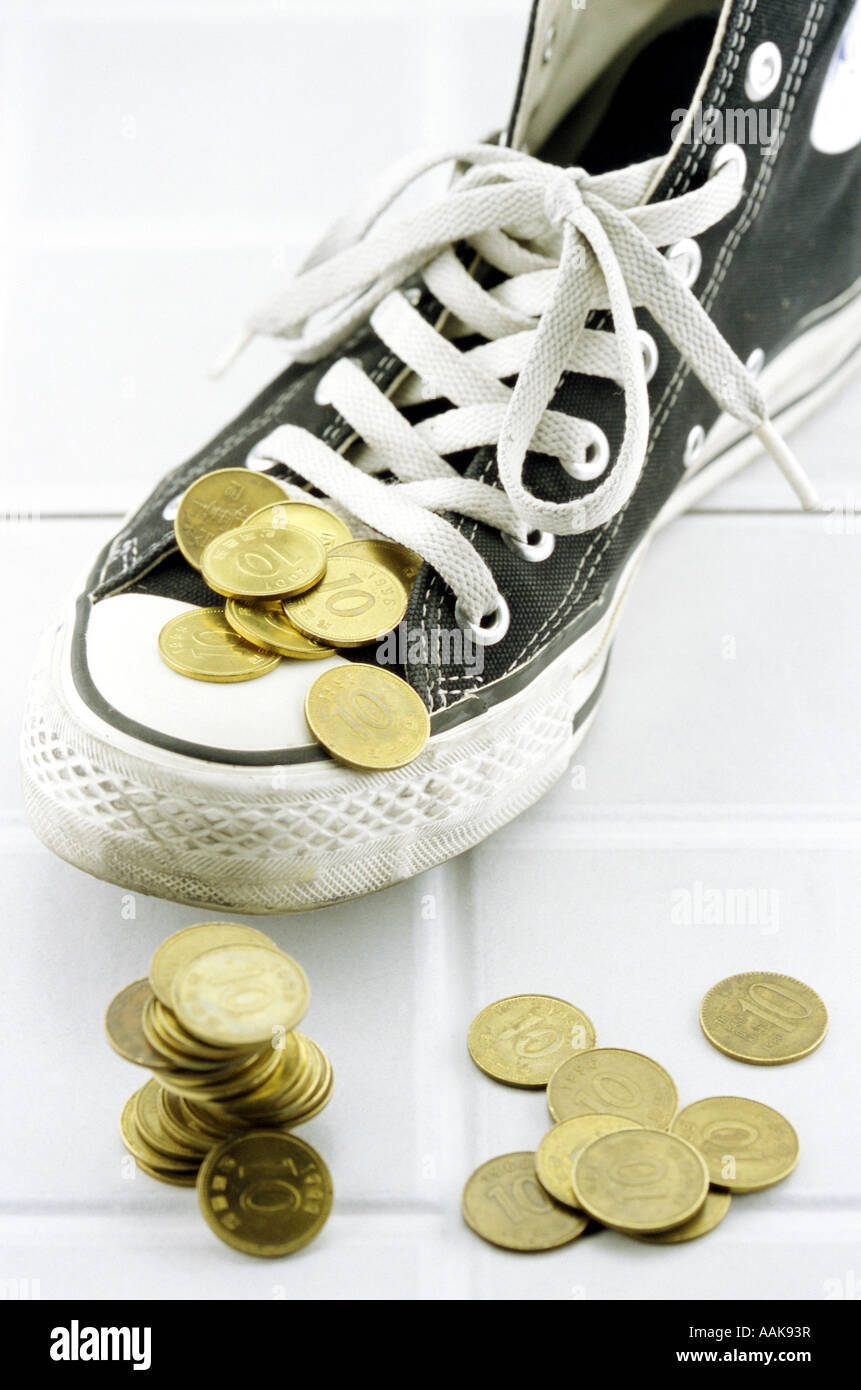 coins on a shoes Stock Photo - Alamy