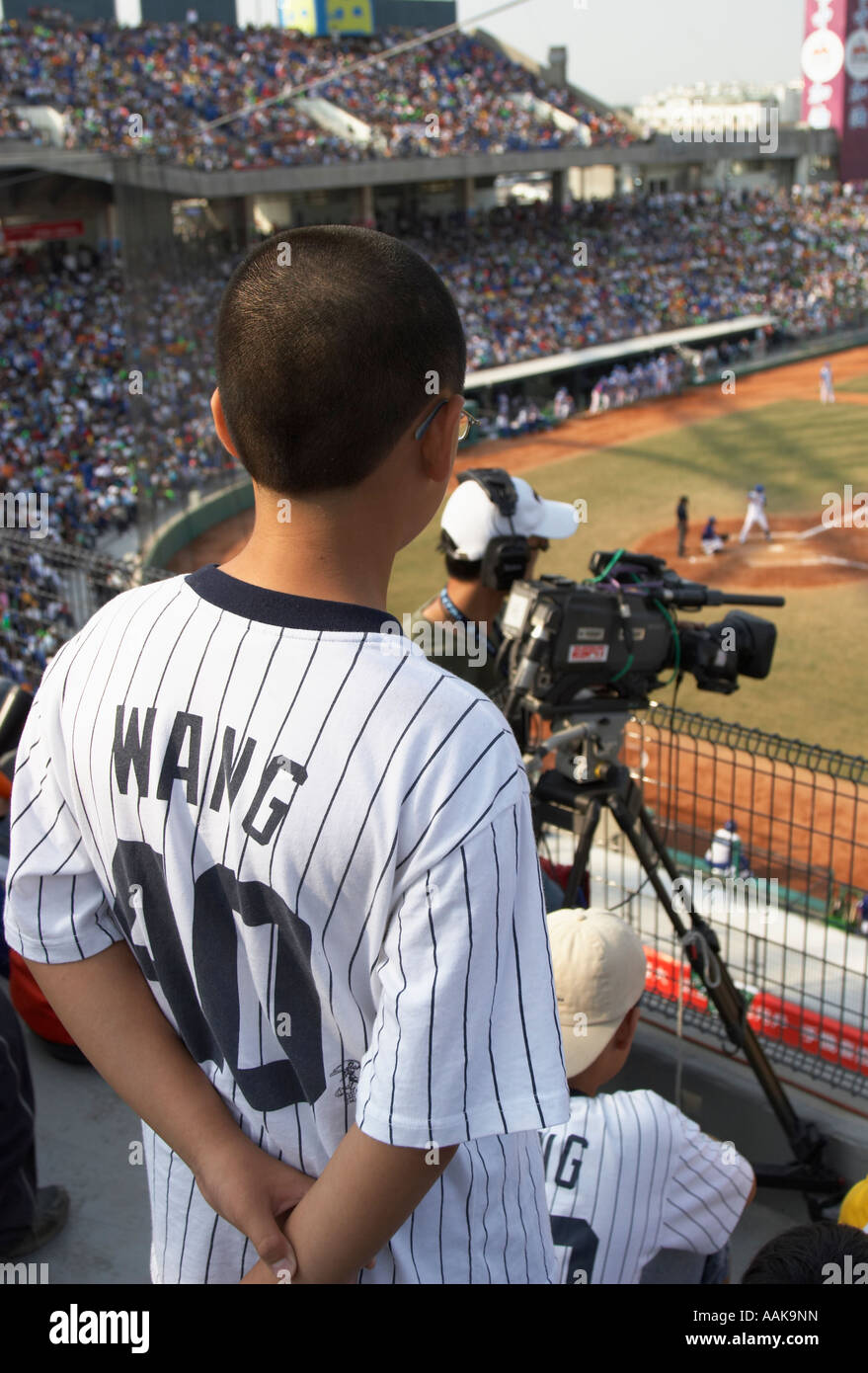 Boy Watching Baseball Game Stock Photo - Alamy