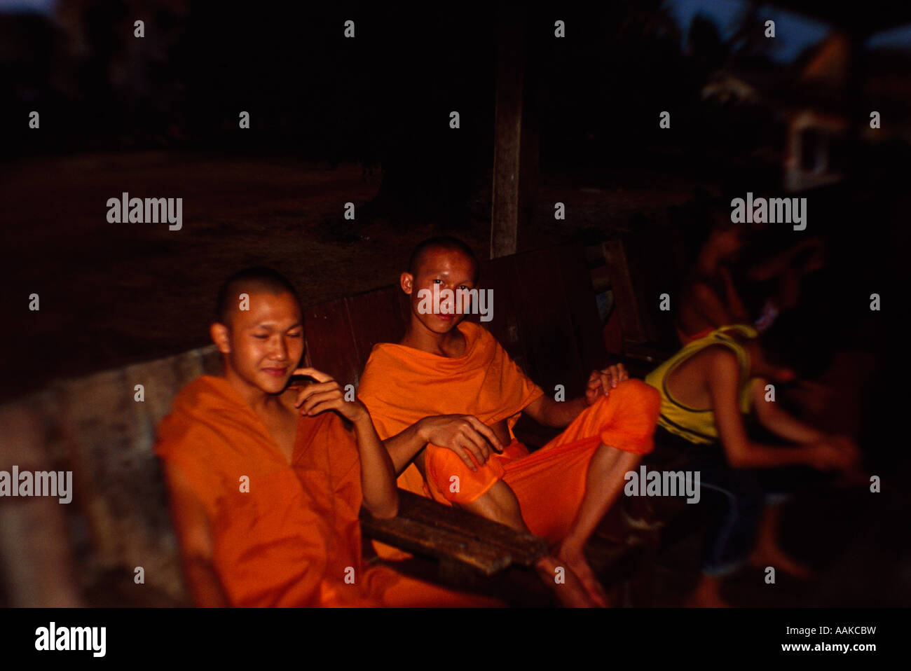 Buddhist monks sitting in monestary Stock Photo - Alamy