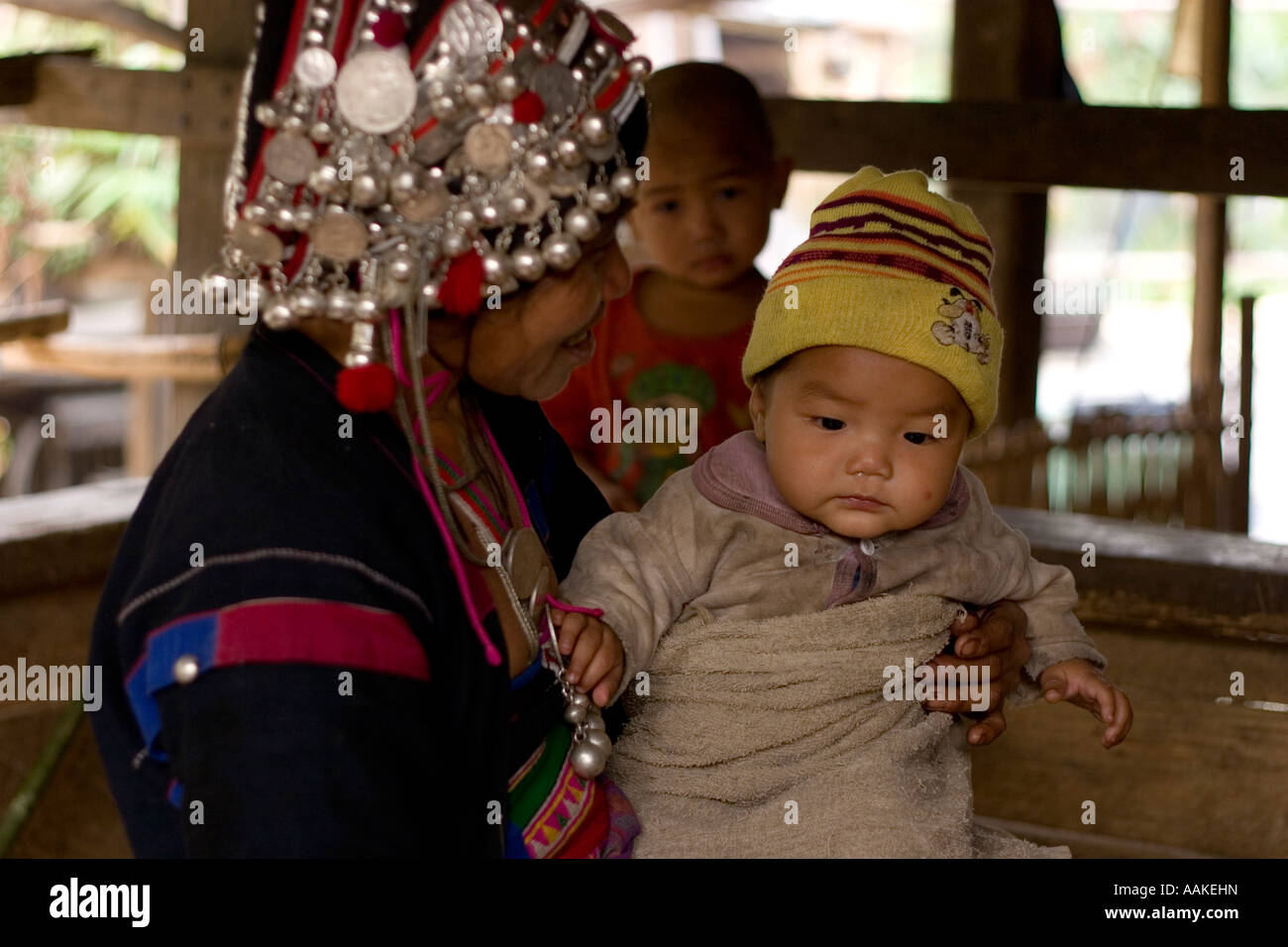 Portrait of an Akha woman and child near Muang Long Laos Stock Photo ...