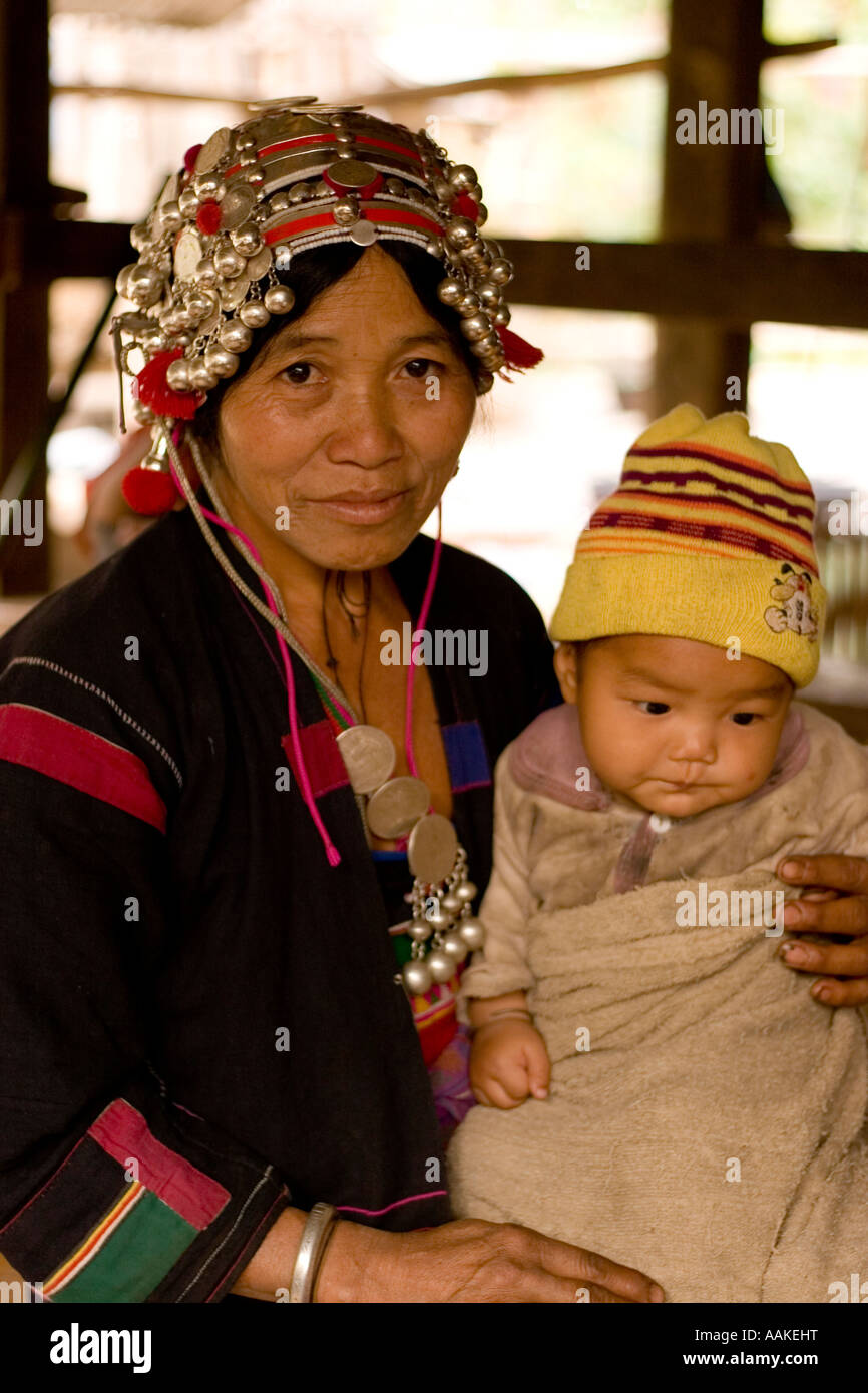 Portrait of an Akha woman and child near Muang Long Laos Stock Photo ...