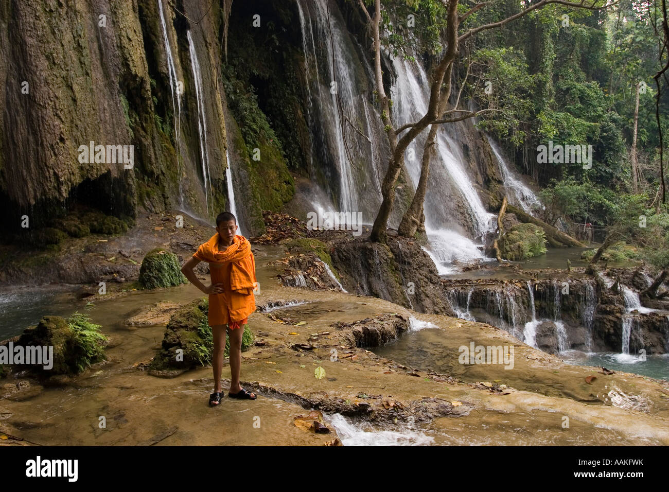 Novice monks Kuang Xi waterfall near Luang Prabang Laos Stock Photo - Alamy