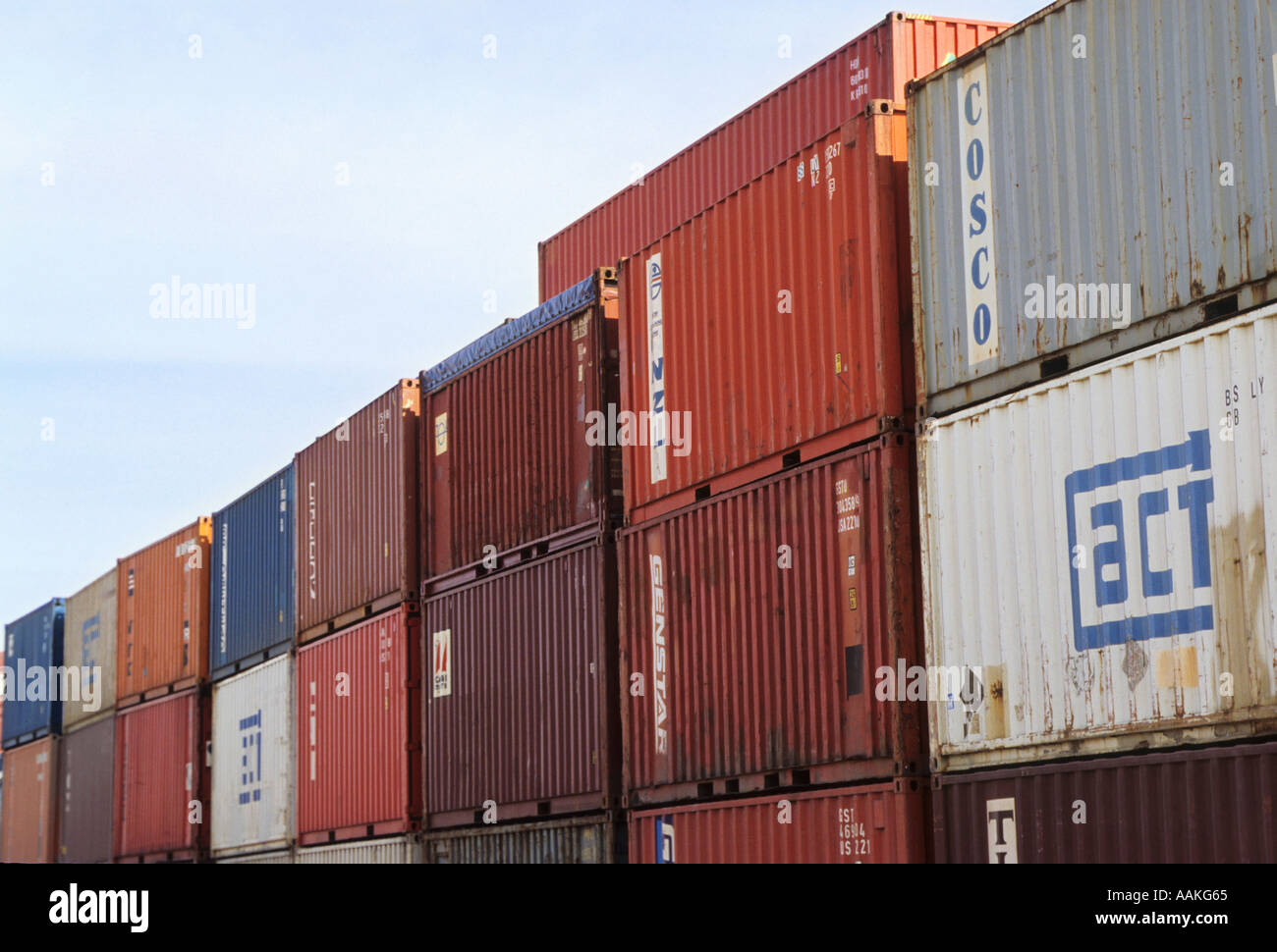 Containers stacked for shipping Stock Photo - Alamy