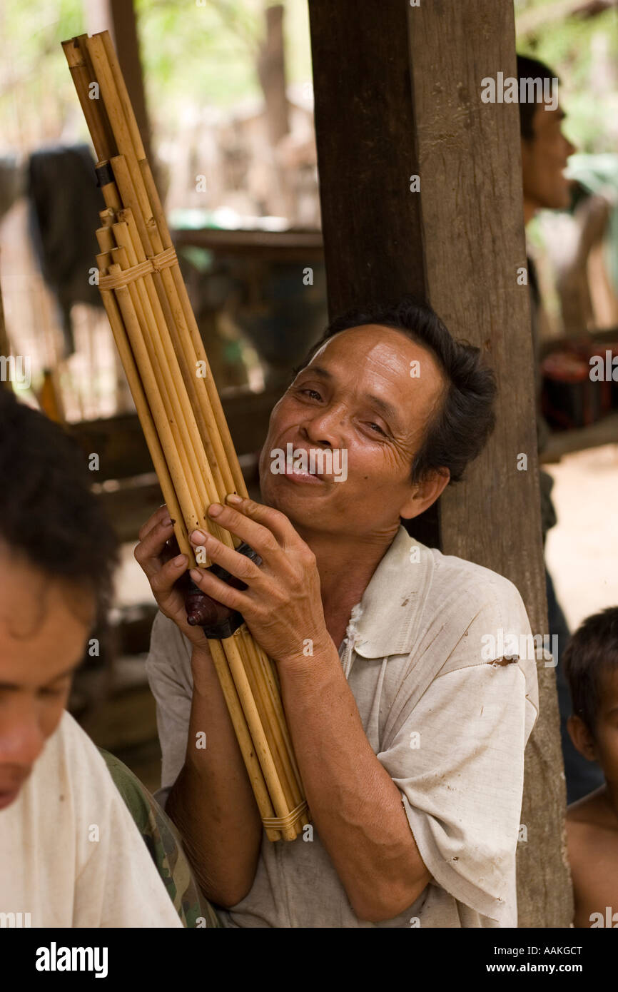 Man playing bamboo made mouth organ Paam Attapeu Province Laos Stock ...