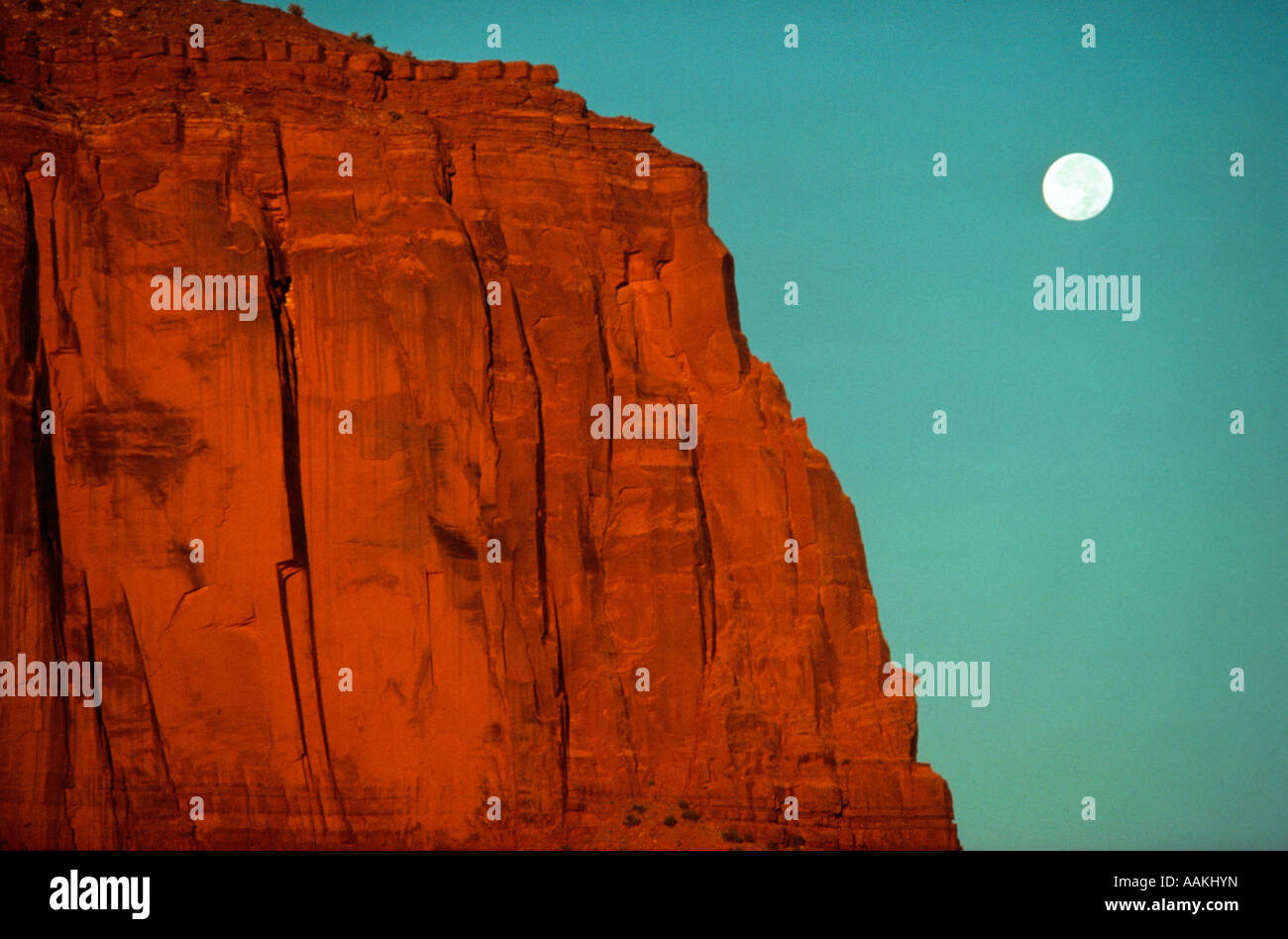 MOON RISE OVER RED ROCKS MONUMENT VALLEY UTAH USA Stock Photo - Alamy