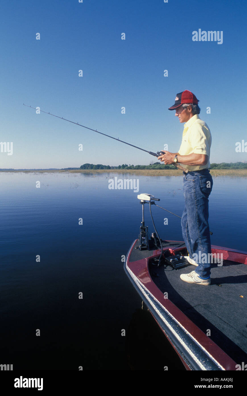 1991 MAN BASS FISHING USING BASS BOAT Stock Photo - Alamy