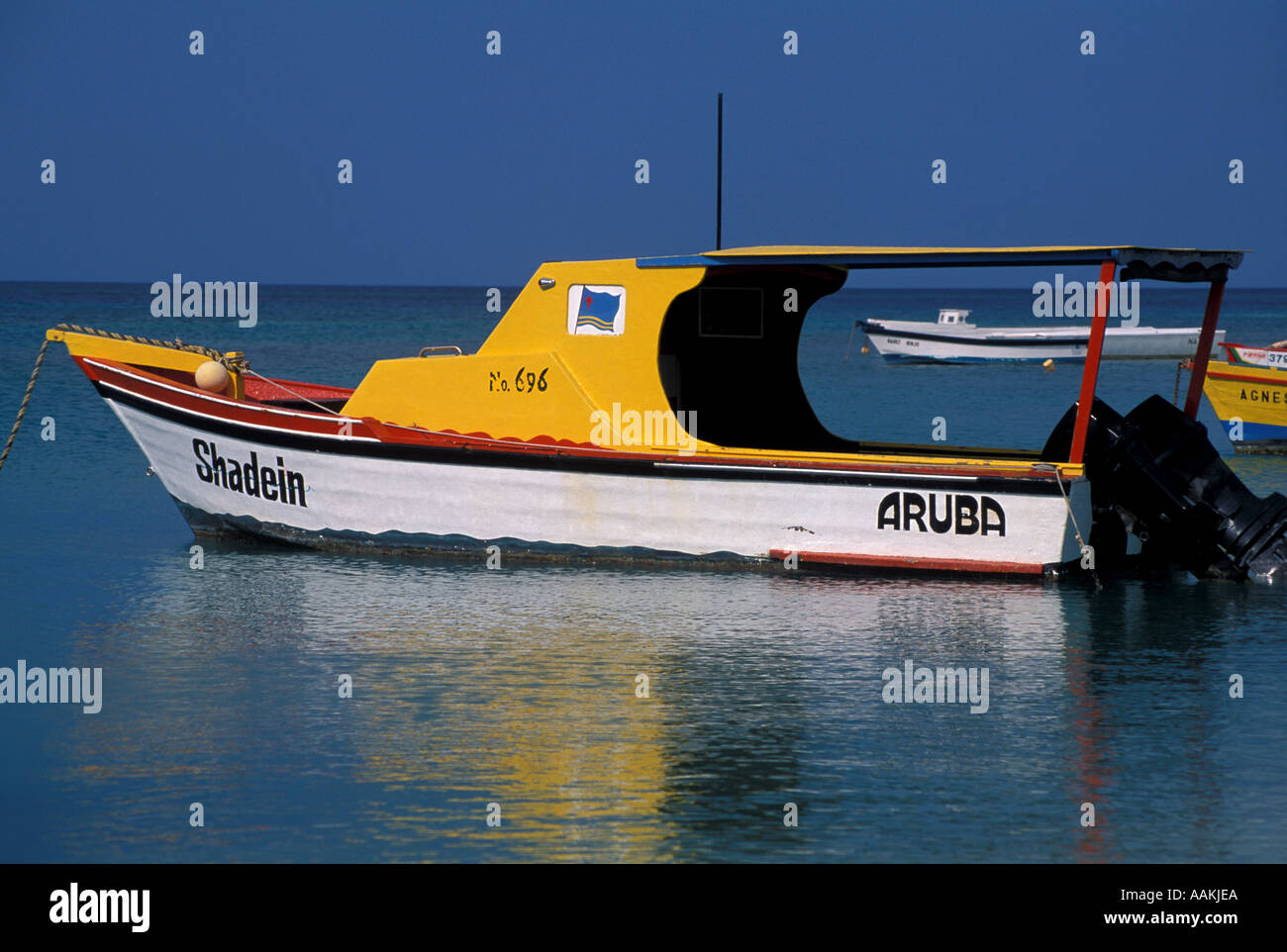 Aruba fishing boats Stock Photo - Alamy