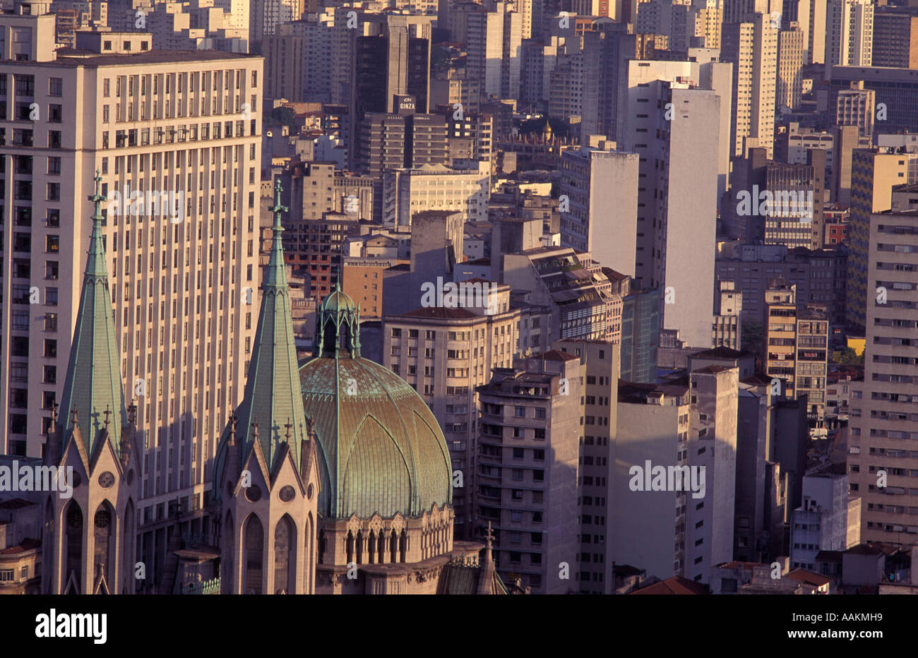 Downtown Sao Paulo, Brazil. Catholic church roof and commercial ...