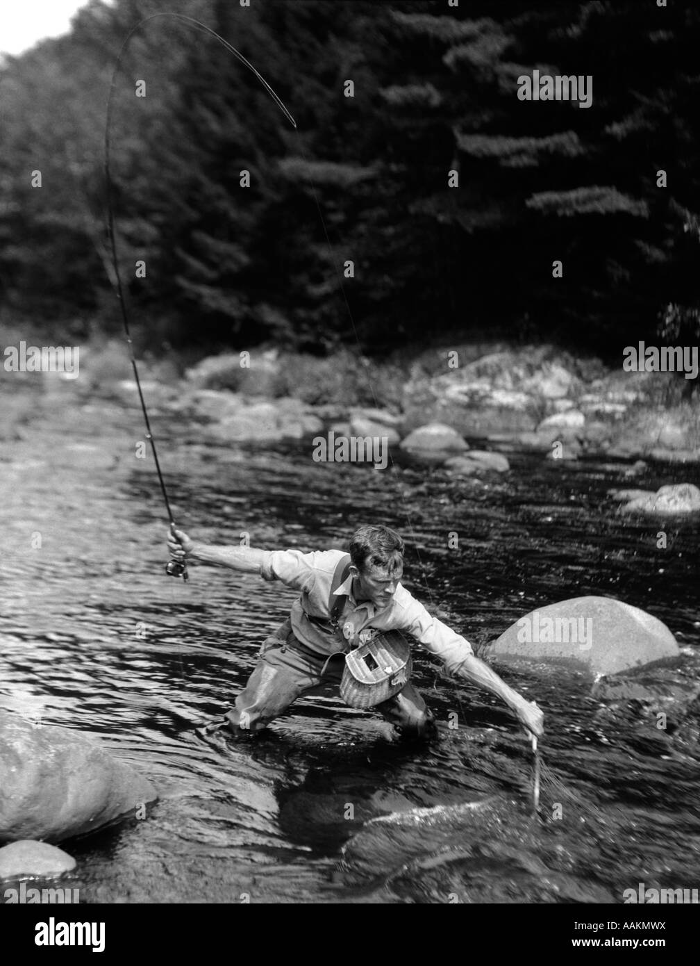 Fish in net line Black and White Stock Photos & Images - Alamy