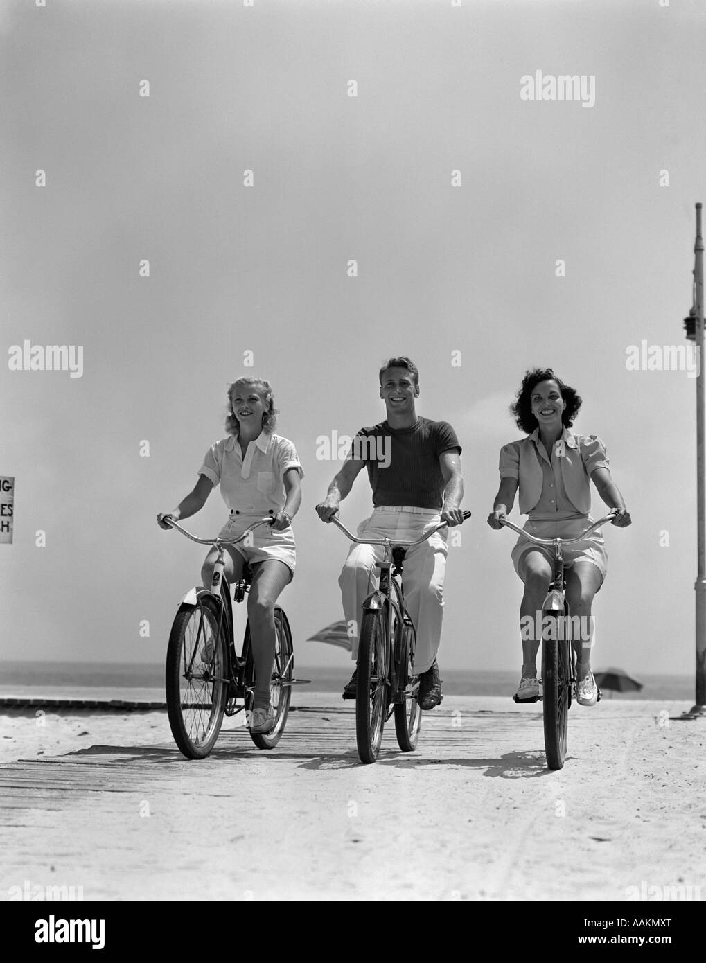 Two women man group Black and White Stock Photos & Images - Alamy