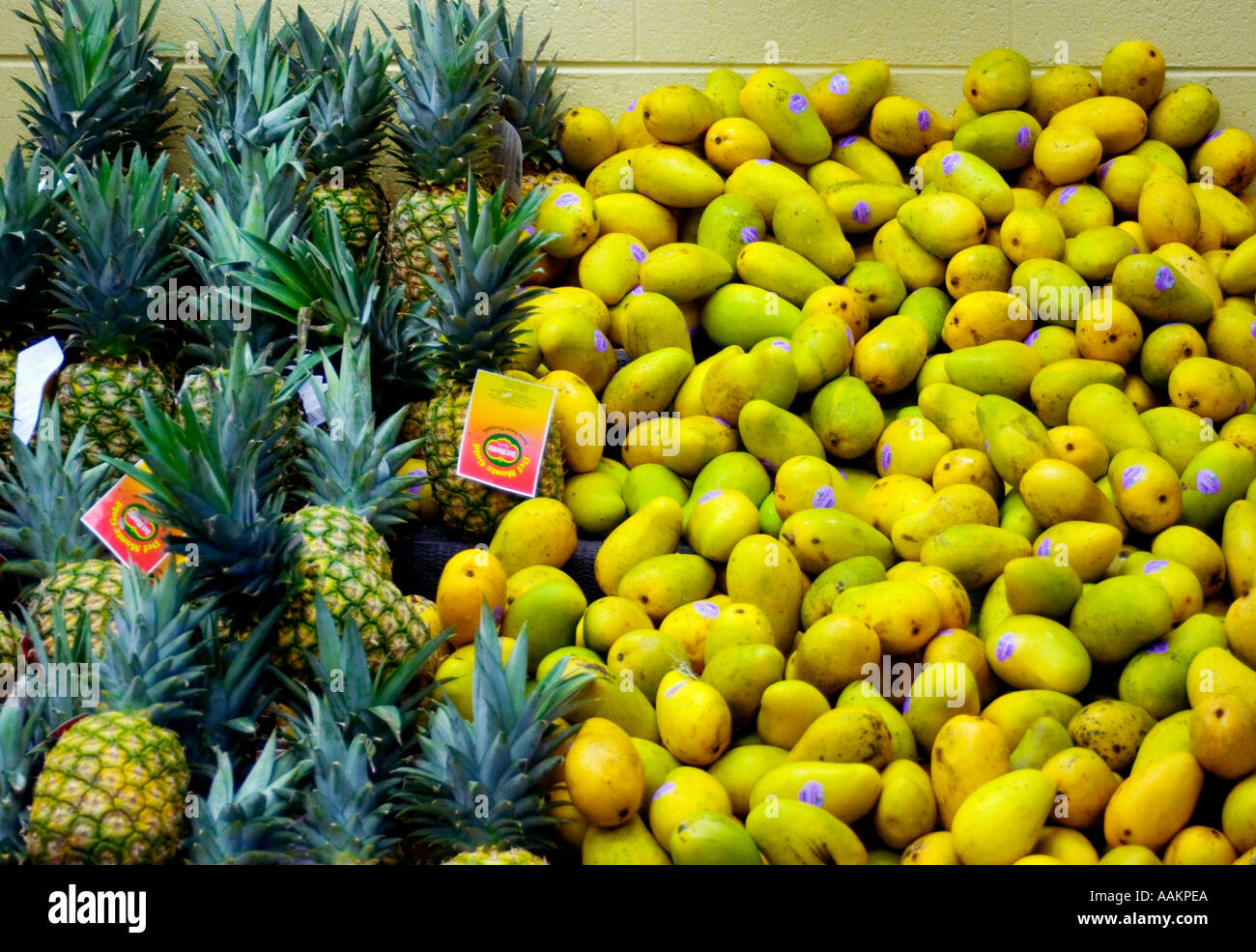 mango mangoes pineapple Stock Photo - Alamy