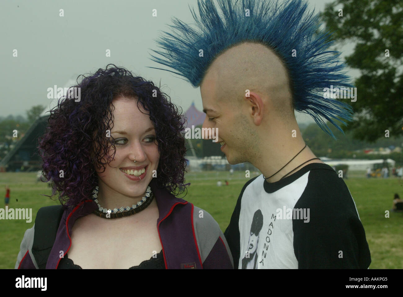 A punk rocker smiles at his girlfriend Stock Photo - Alamy